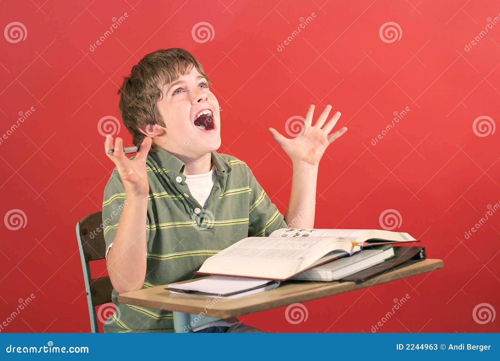 Kid screaming at desk stock image. Image of happiness - 2244963