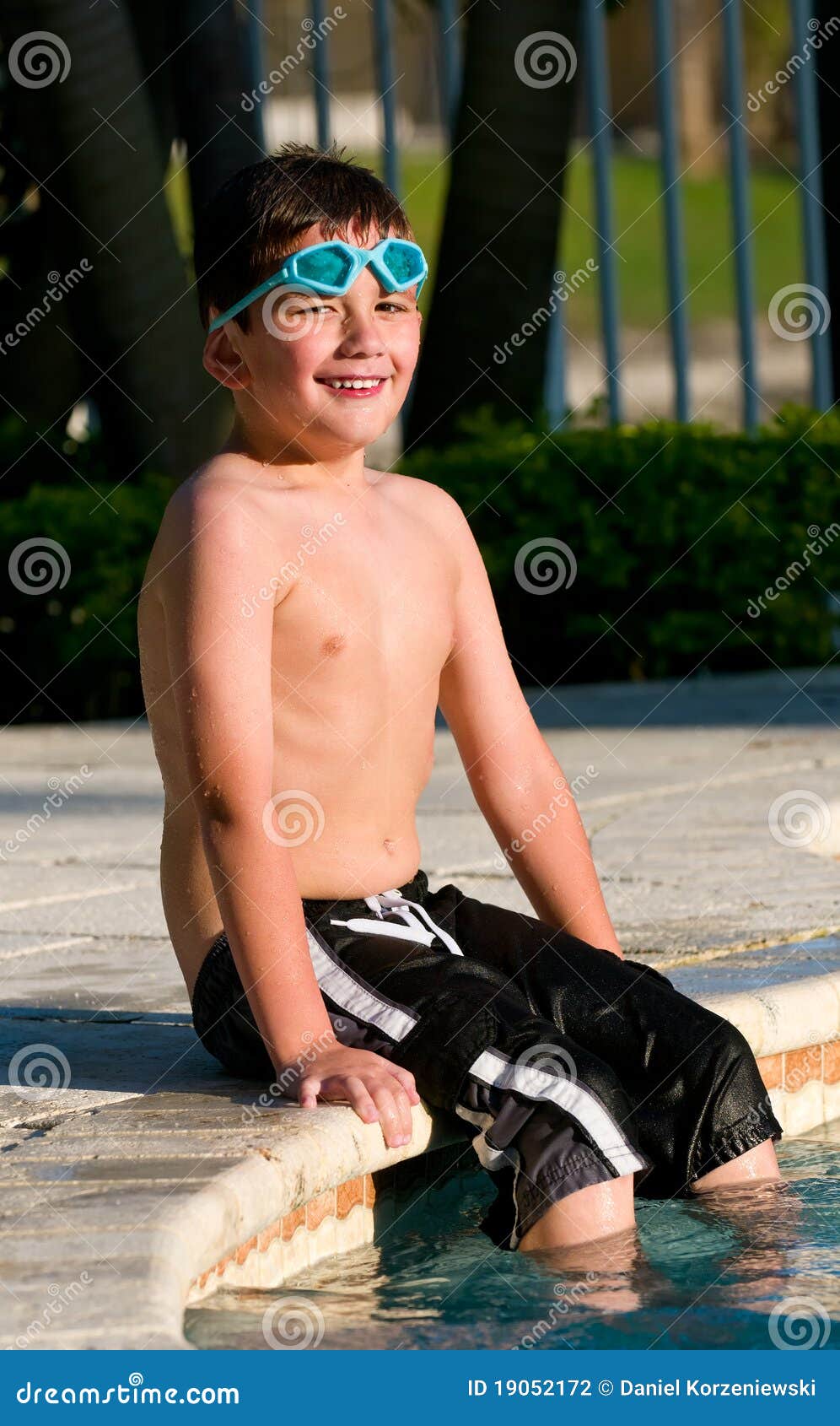 Kid seated in the pool stock photo. Image of joyful, cute - 19052172