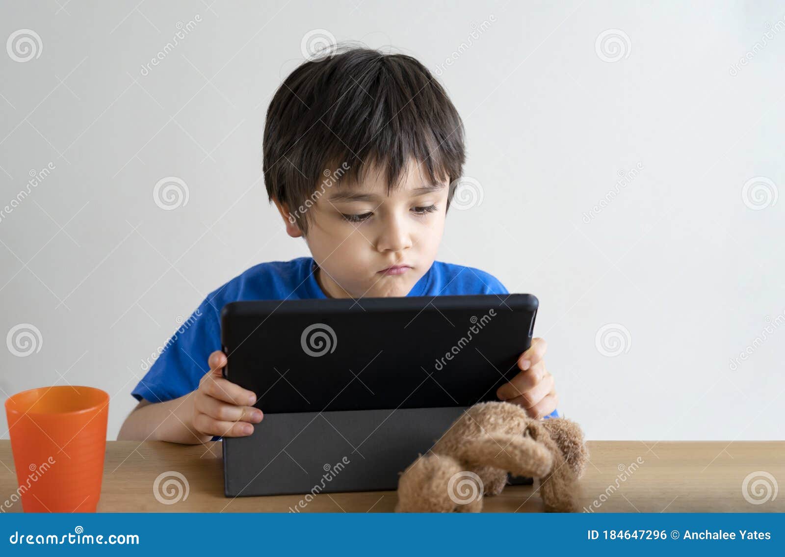 Kid Self Isolation Using Tablet for His Homework,Child Doing Using ...