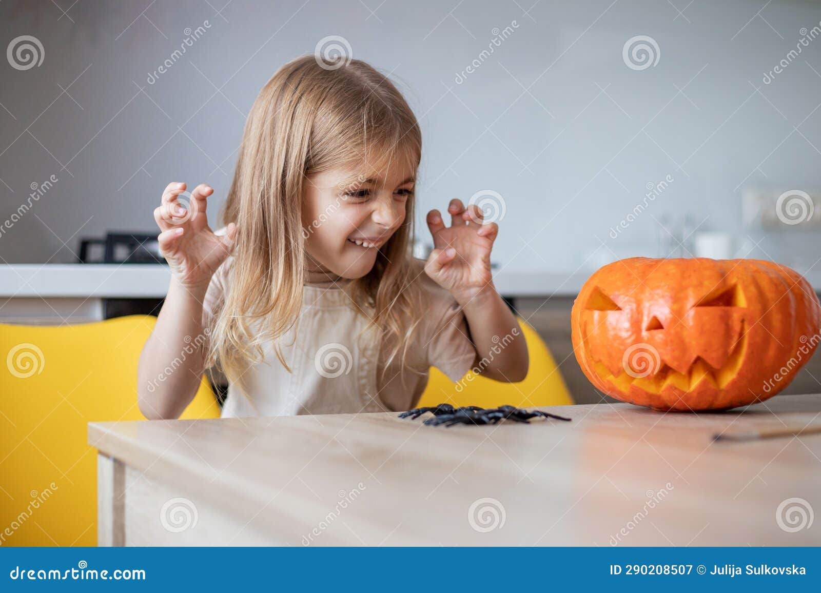 Kid Showing To Jack O Lantern a Spooky Face. Stock Image - Image of ...