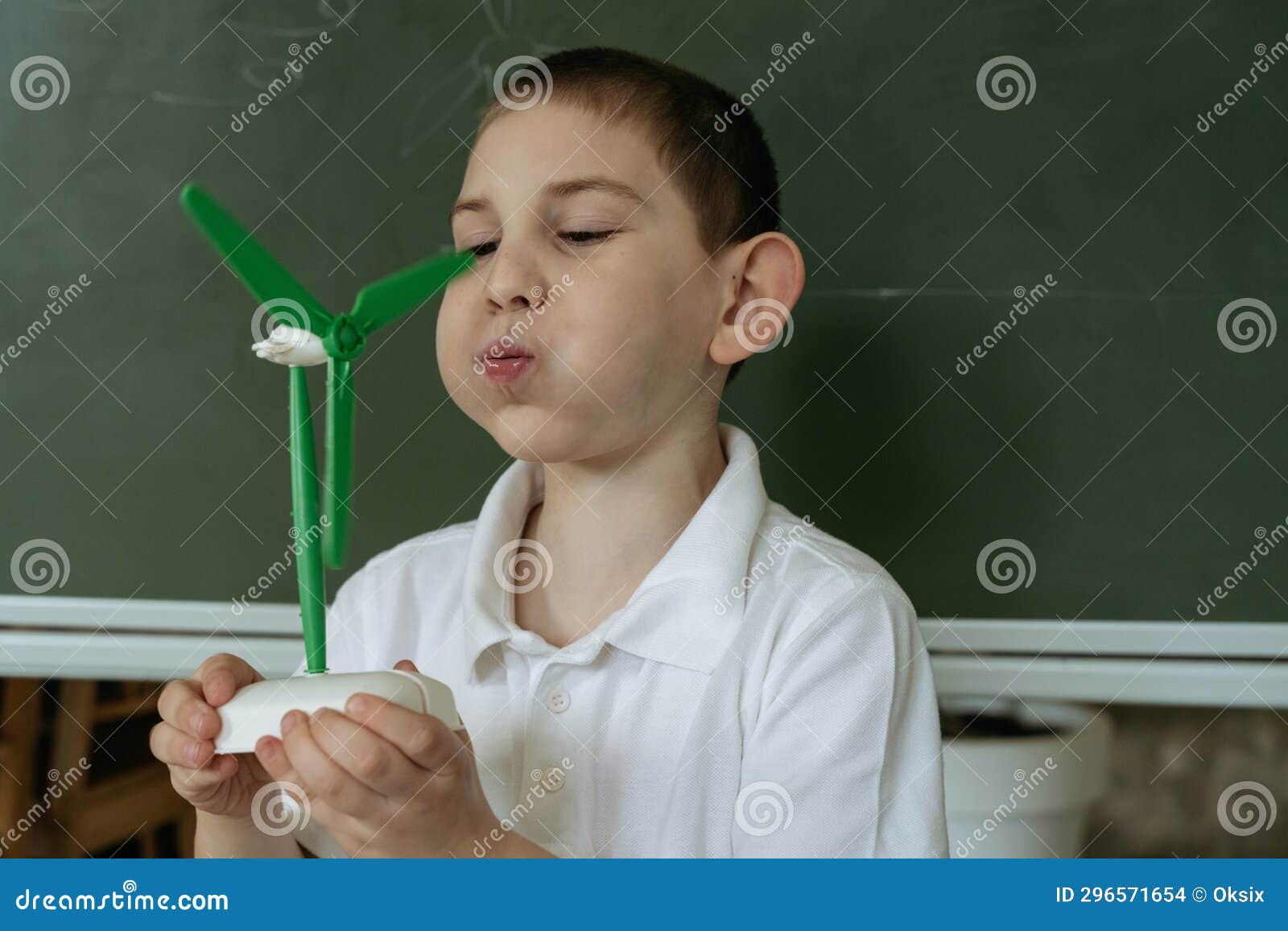 Kid Shows and Explains about Wind Generator Model at School Stock Photo ...