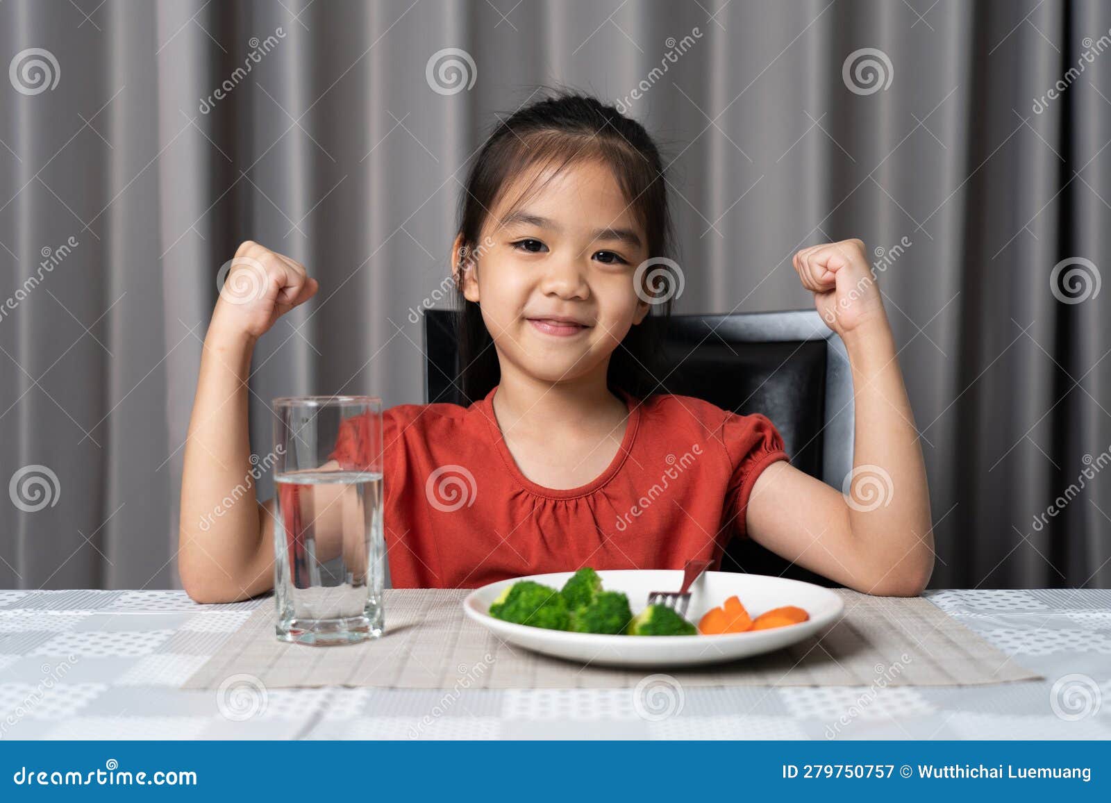 Kid Shows Strength of Eats Vegetables and Nutritious Food Stock Image ...
