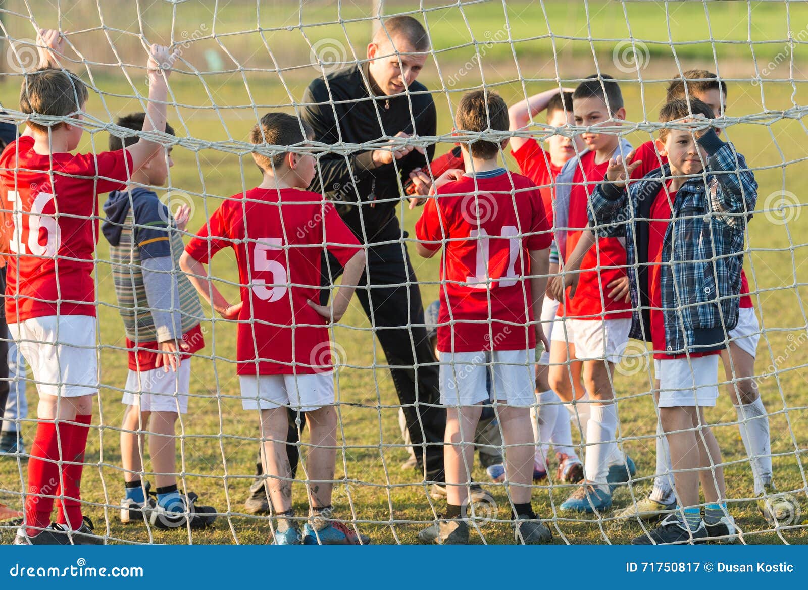 Kid soccer team stock image. Image of trainer, event - 71750817