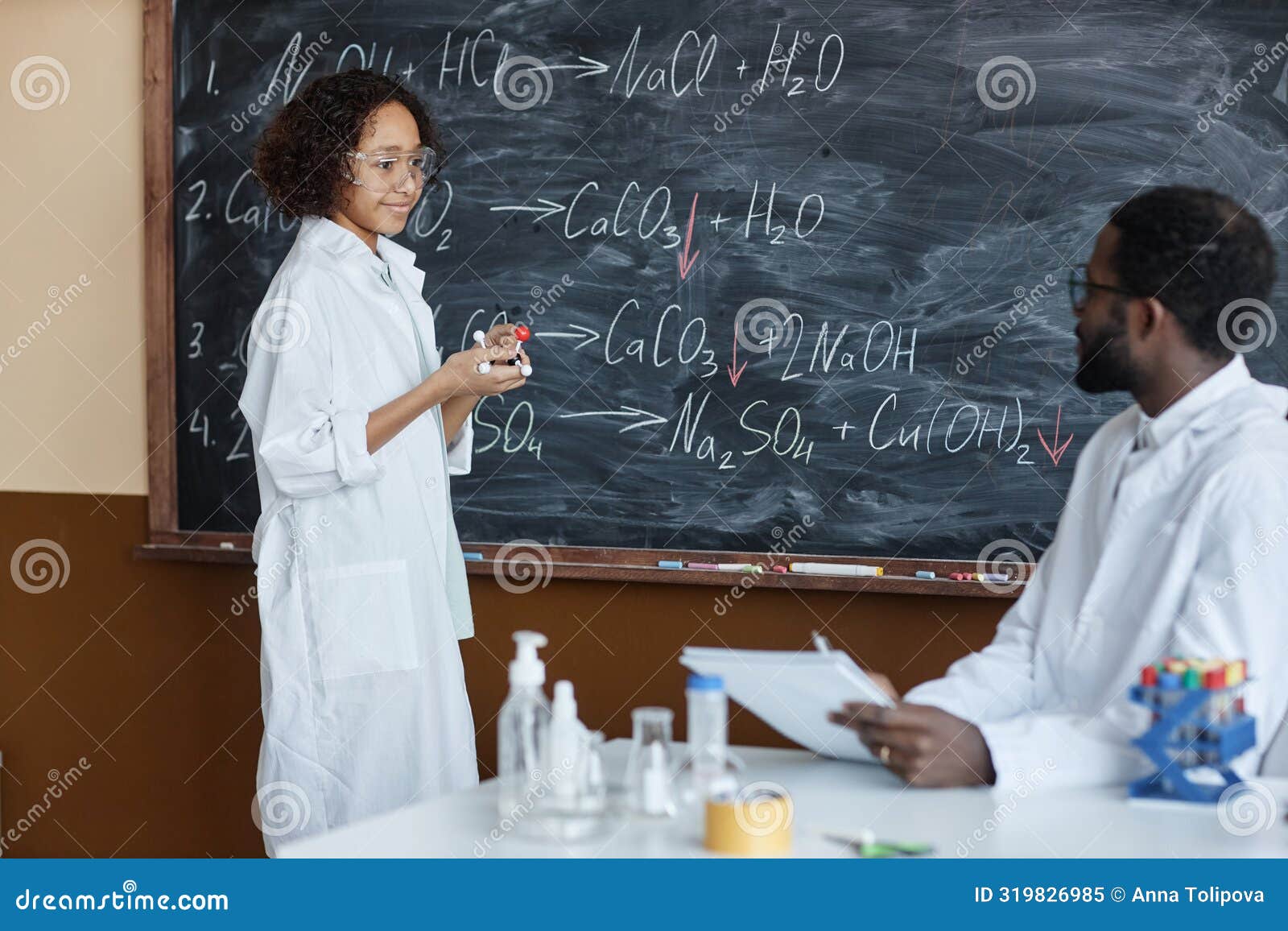 Kid Solving Chemistry Problem at Blackboard Stock Image - Image of ...