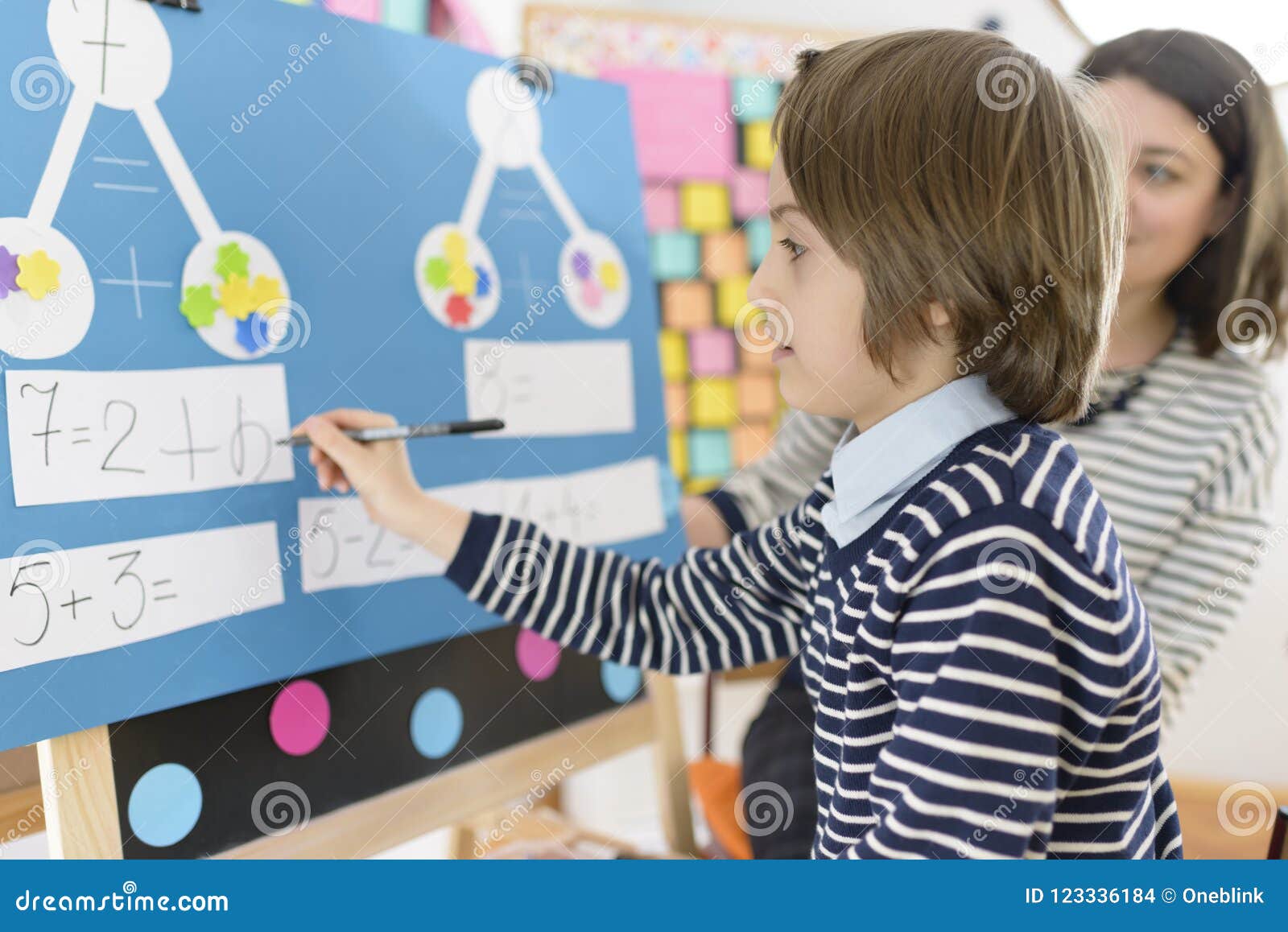 Kid Solving Math Exercises stock photo. Image of lesson - 123336184