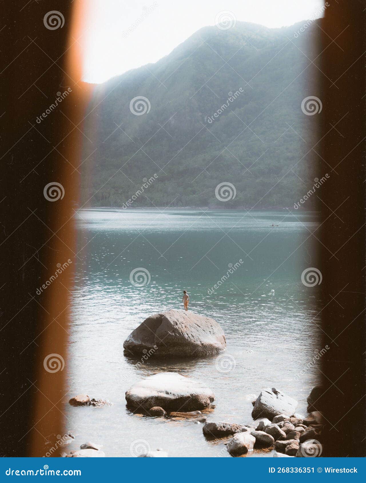 Kid Standing on Rock Surrounded by Water Stock Image - Image of stones ...