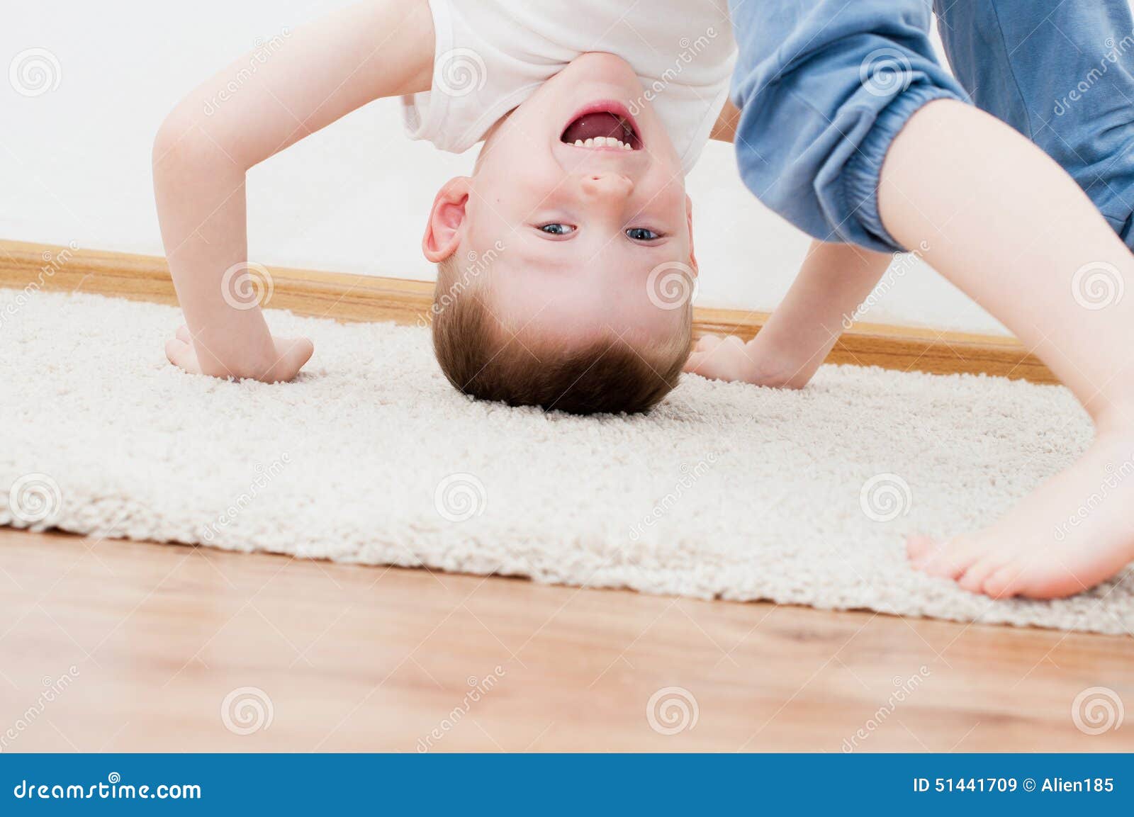 Kid standing upside down stock image. Image of adho, leisure - 51441709