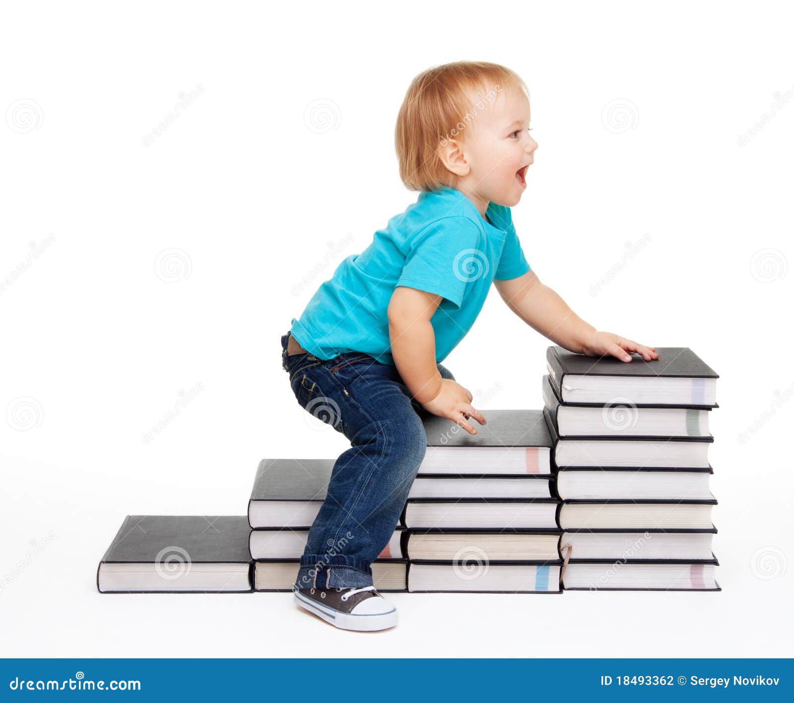 A kid on a steps of books stock photo. Image of preschool - 18493362