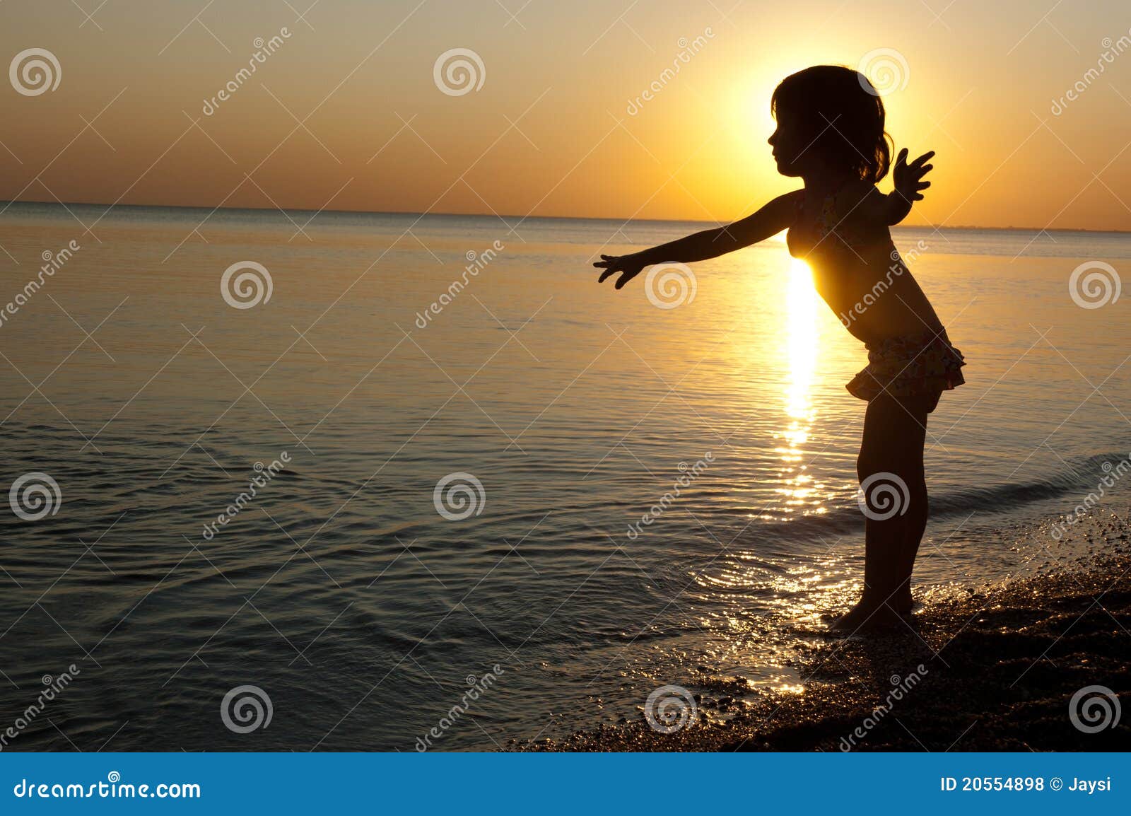 Kid on sunset beach stock photo. Image of evening, girls - 20554898