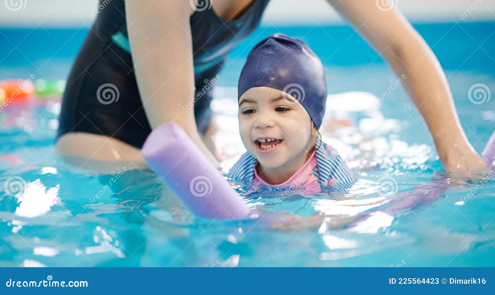 Kid swim on floating pipe stock image. Image of little - 225564423