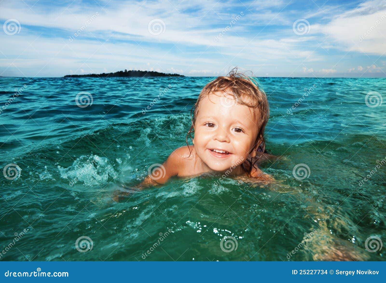 Kid swimming in the sea stock photo. Image of leisure - 25227734