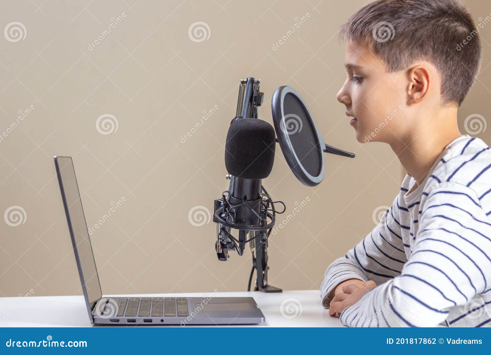 Kid with Laptop Computer Talking into Microphone. Techology, Online ...