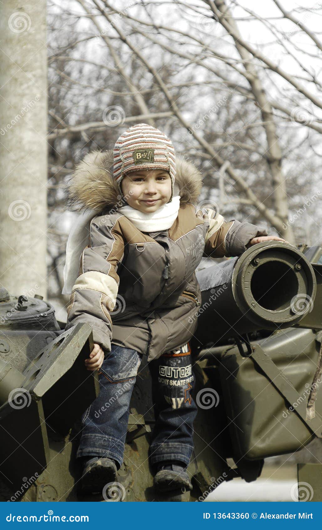 Kid on a tank stock photo. Image of aiming, playful, peace - 13643360