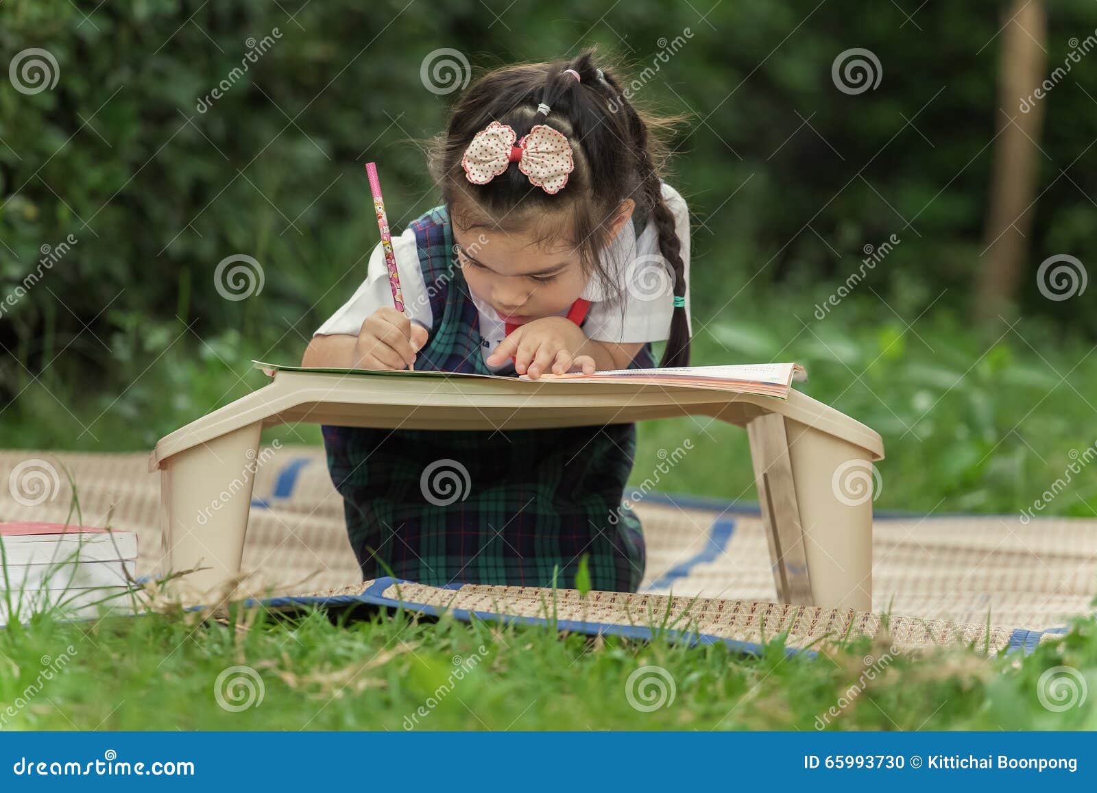 Kid Thinking about Answer Sitting at His Desk Stock Photo - Image of ...