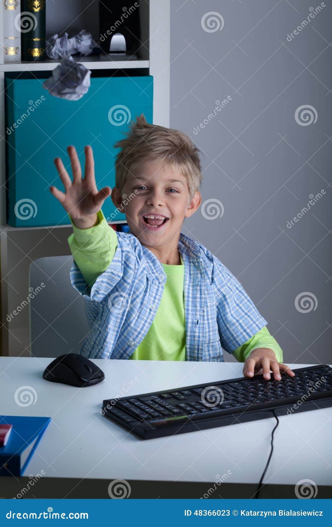 Kid throwing ball of paper stock image. Image of technology - 48366023