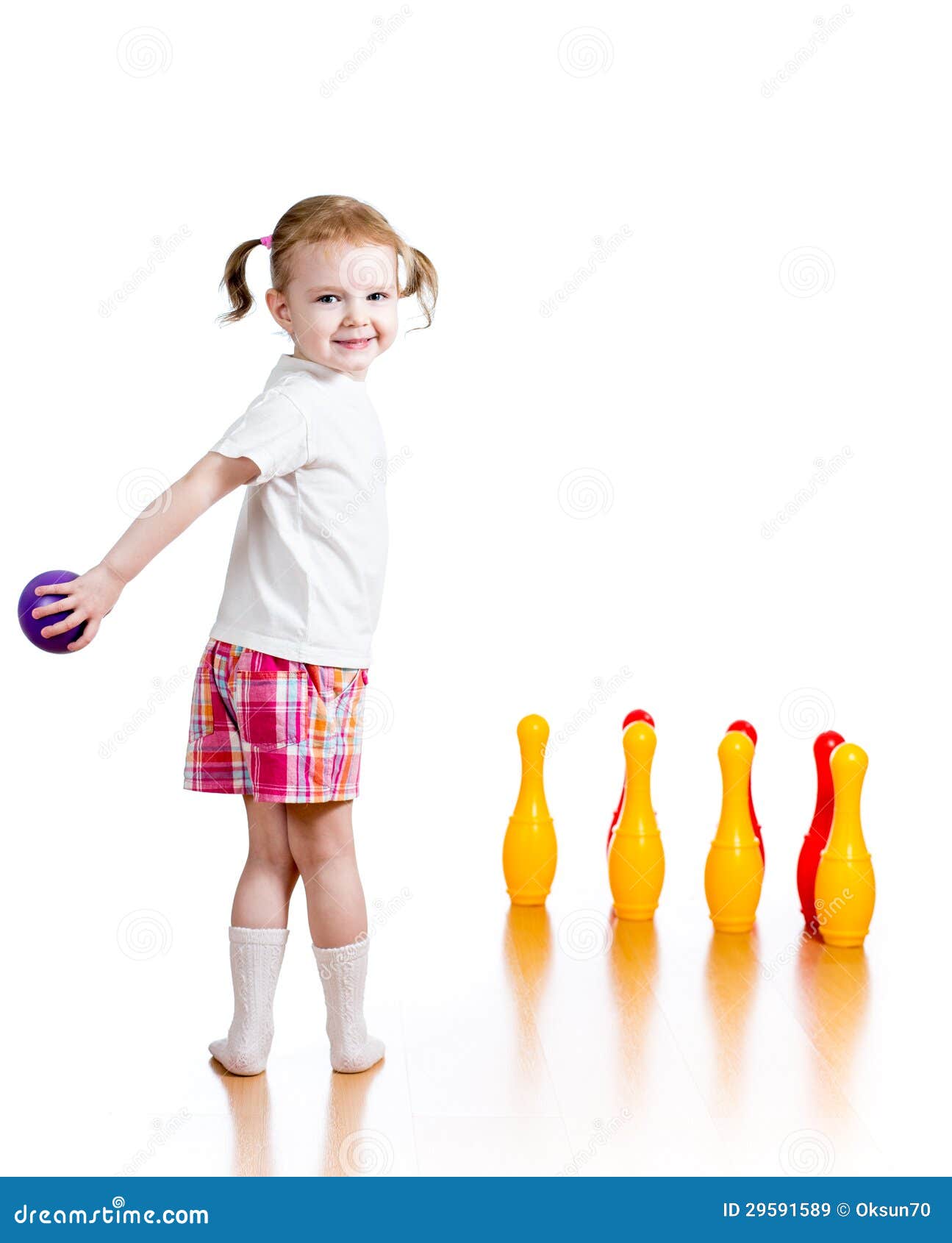 Kid Throwing Ball To Knock Down Toy Pins Stock Image - Image of cute ...