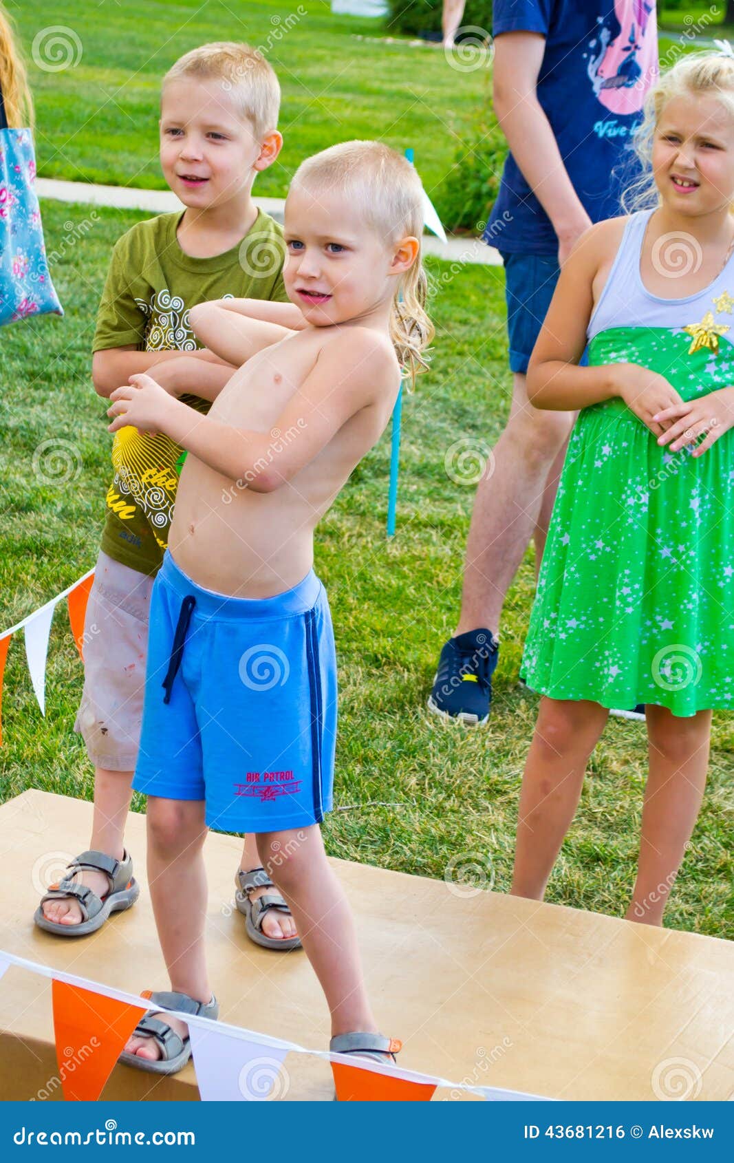 Kid Throwing Balls at a Target Stock Photo - Image of blond, color ...