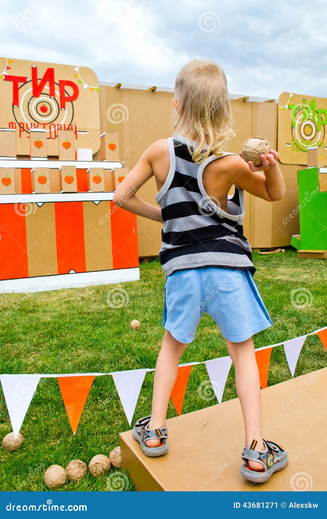 Kid Throwing Balls at a Target Stock Image - Image of color, accurately ...