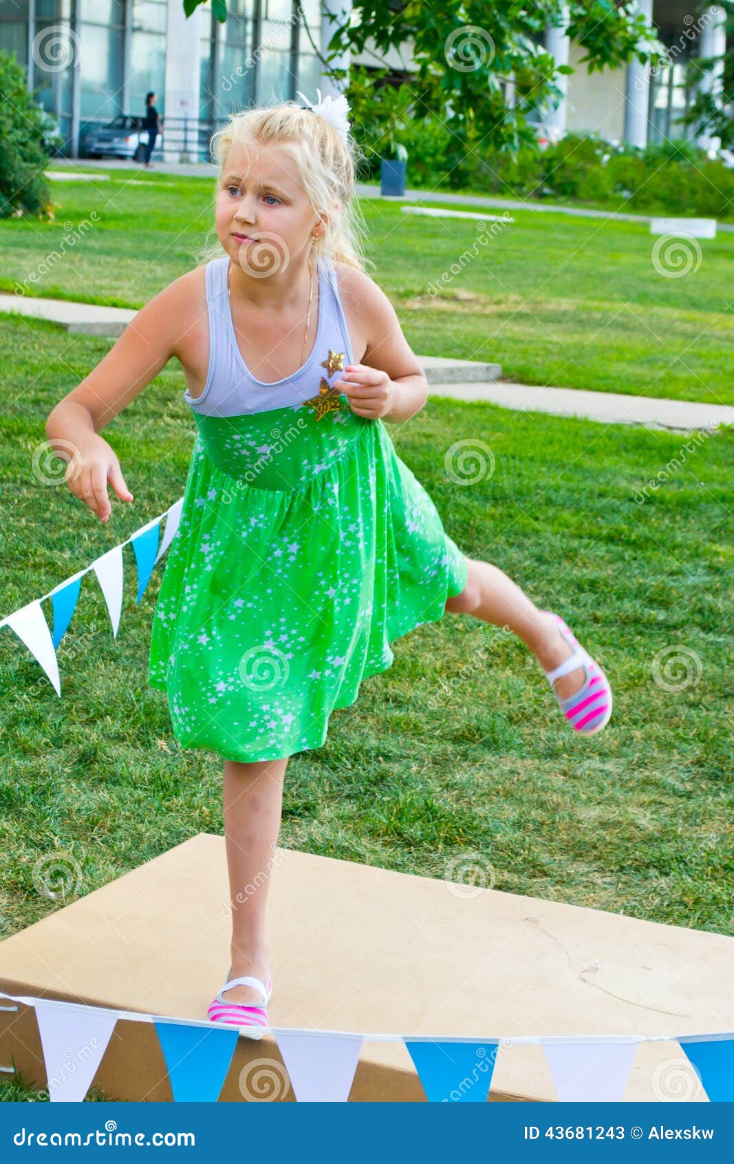 Kid Throwing Balls at a Target Stock Image - Image of blond, field ...