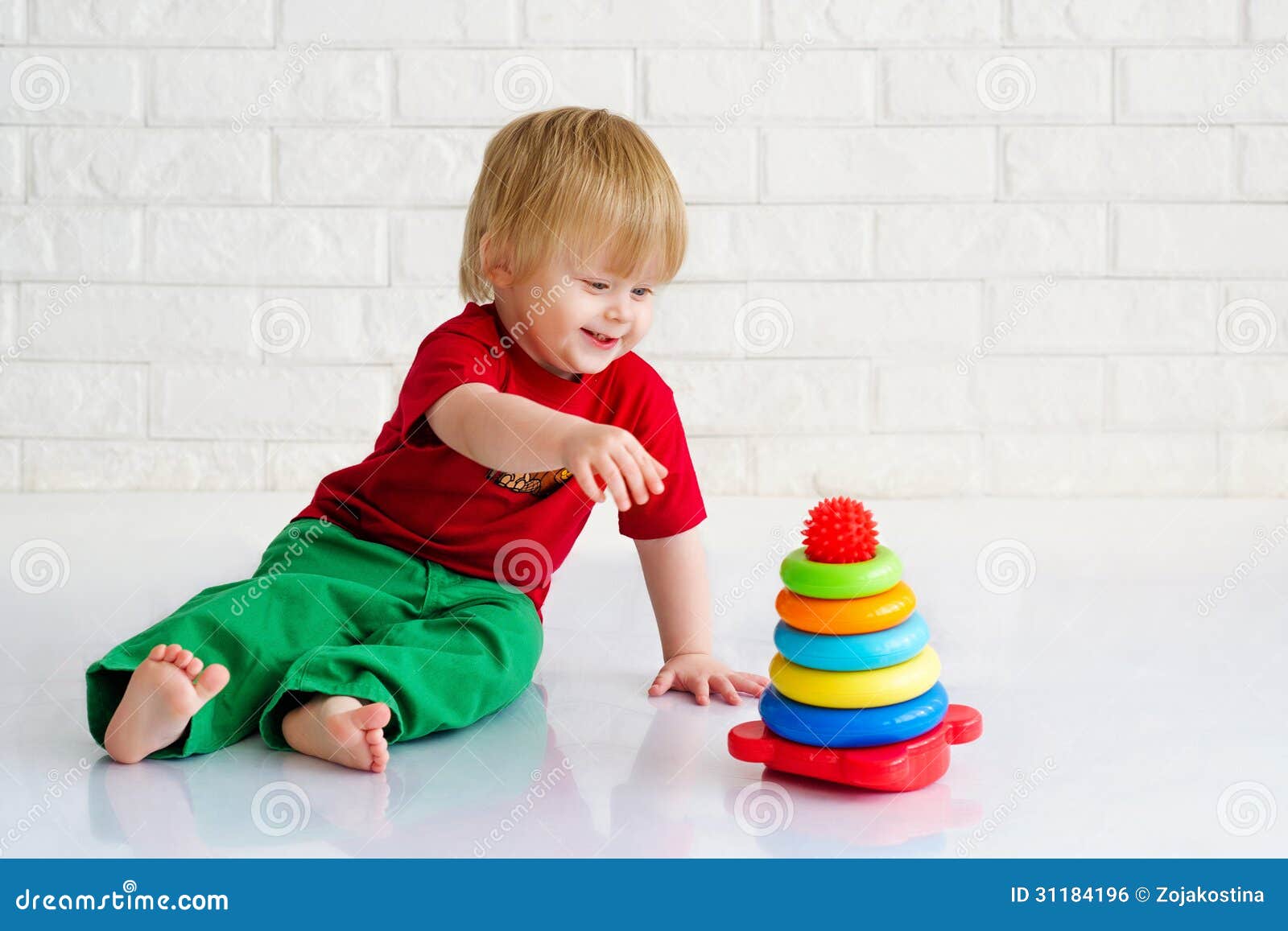 Kid and toy pyramid stock photo. Image of cute, lifestyle - 31184196