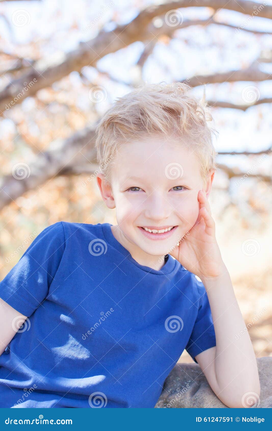 Kid at the tree stock image. Image of cheerful, blue - 61247591