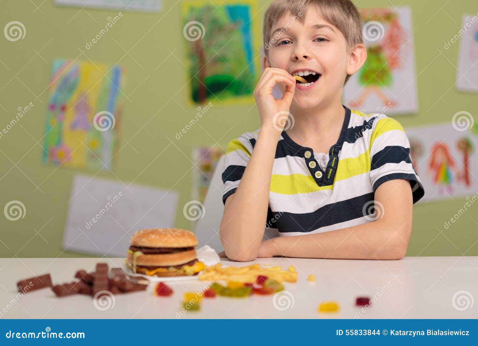 Kid and unhealthy snacks stock photo. Image of food, brunch - 55833844