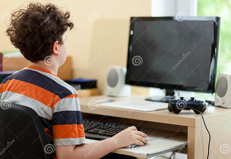 Kid using computer stock photo. Image of homework, computer - 16190700