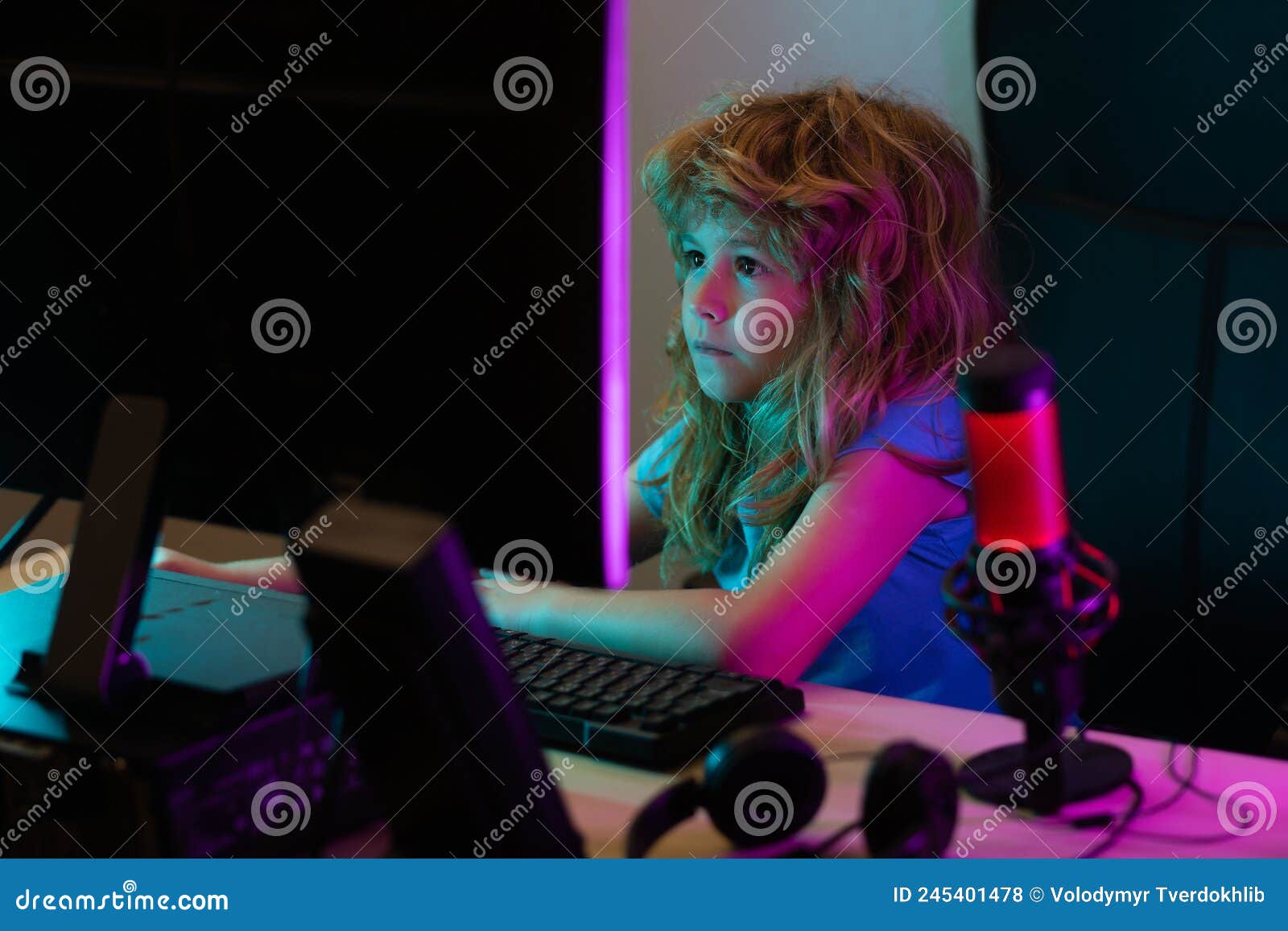 Kid Using Pc at Night. Child with Computer in a Dark Room. Stock Photo ...