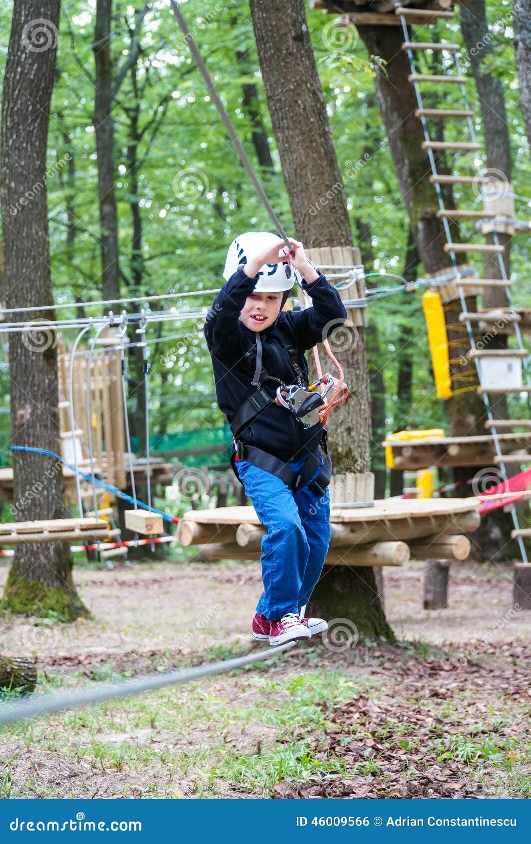 Kid Walking on a Wire in Adventure Park Stock Photo - Image of ...