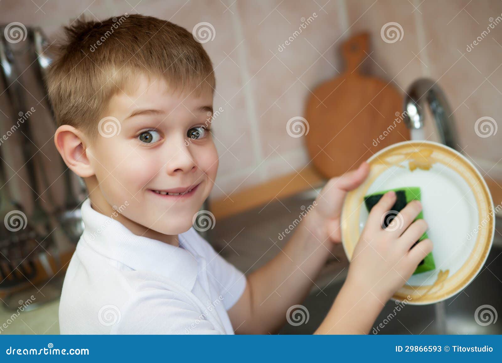 Little Boy is Washing Dishes in the Kitchen Stock Image - Image of ...