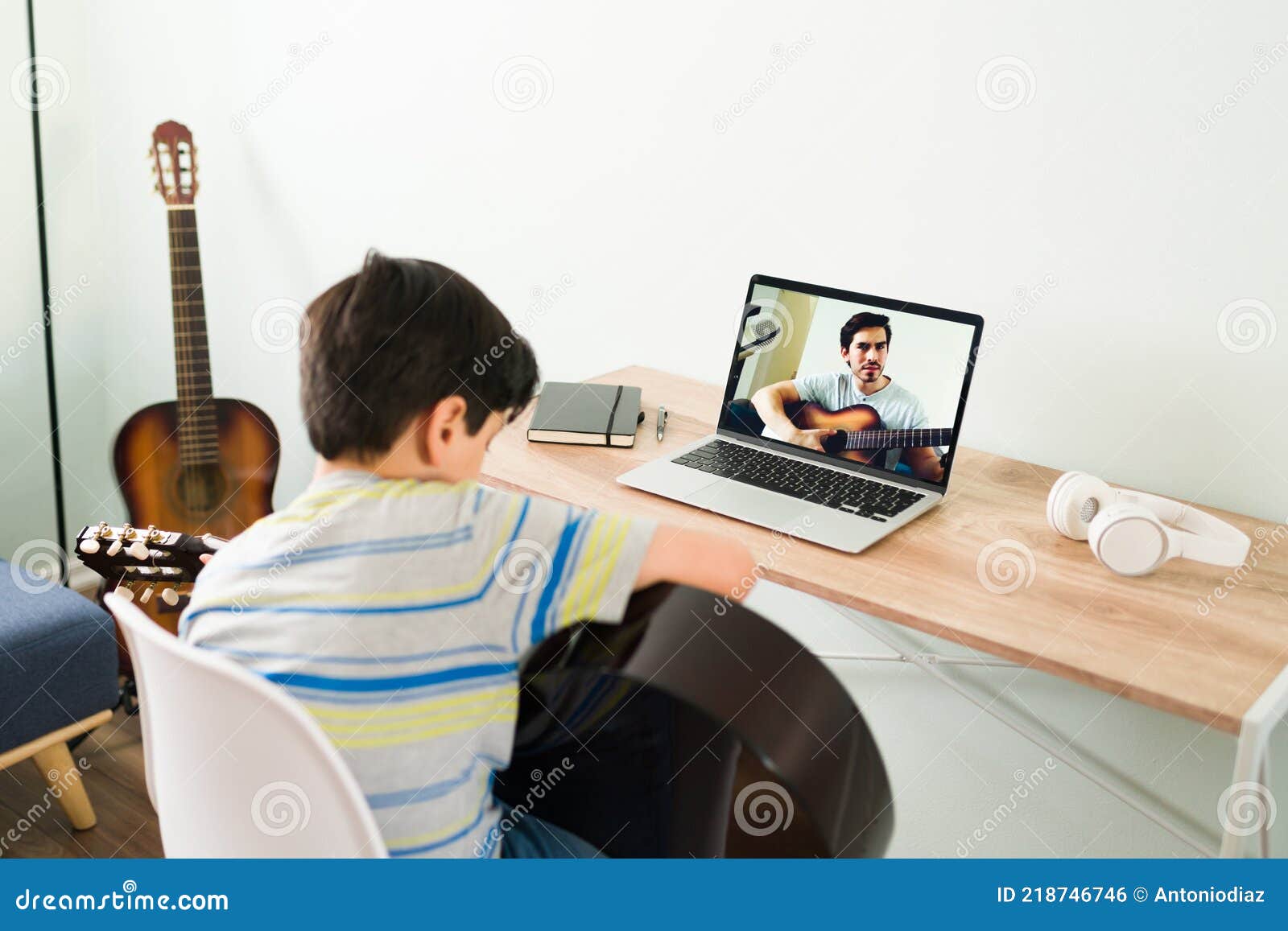Kid Watching a Music Video Tutorial at Home Stock Photo - Image of ...