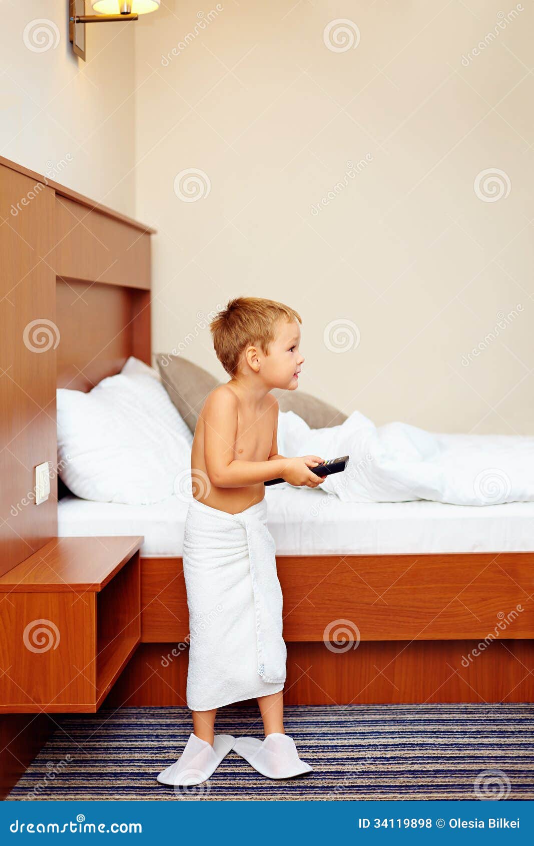 Kid Watching Tv in Hotel Room after Bathing Stock Photo - Image of ...