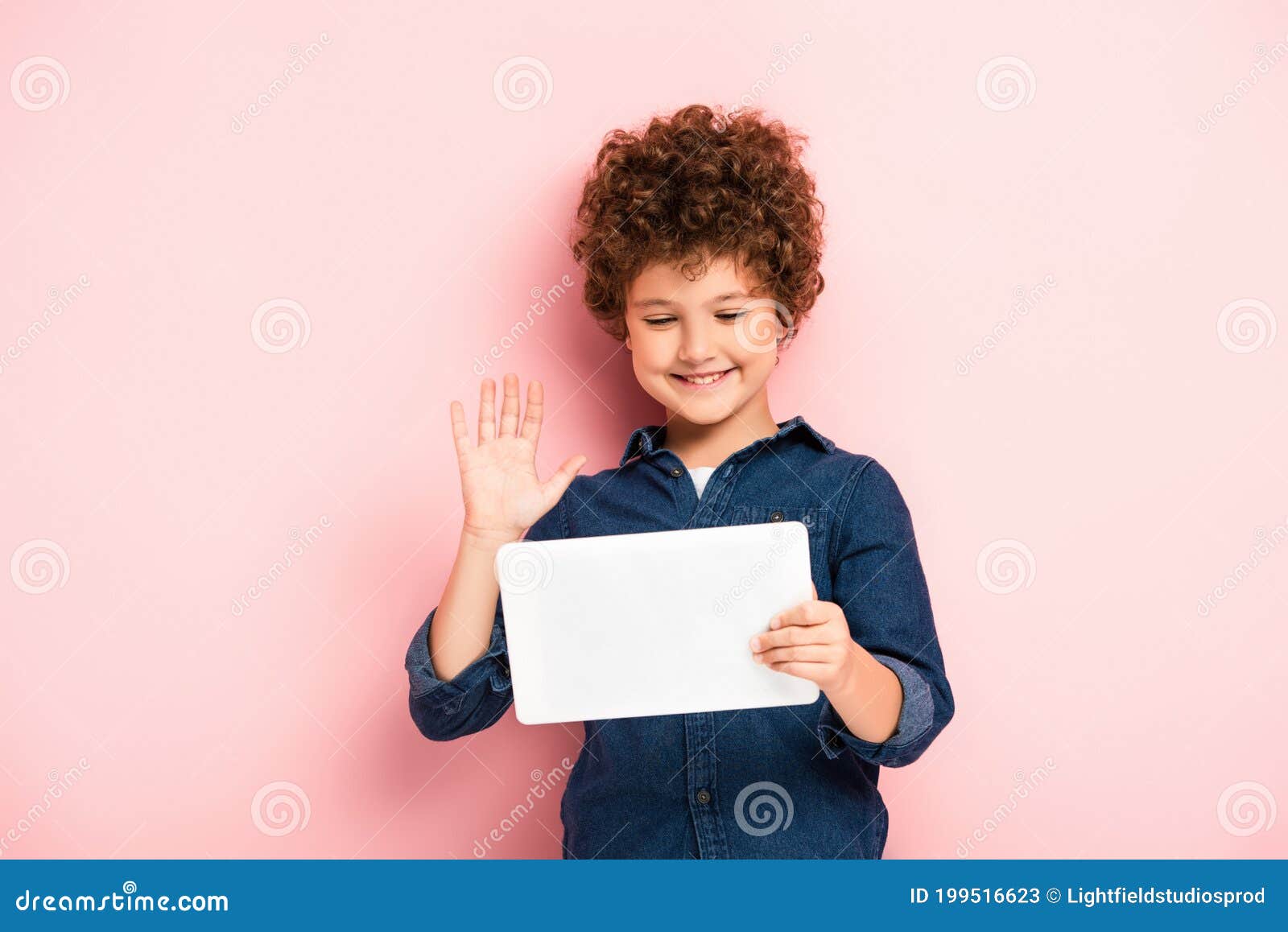 Kid Waving Hand while Using Digital Stock Image - Image of cheerful ...