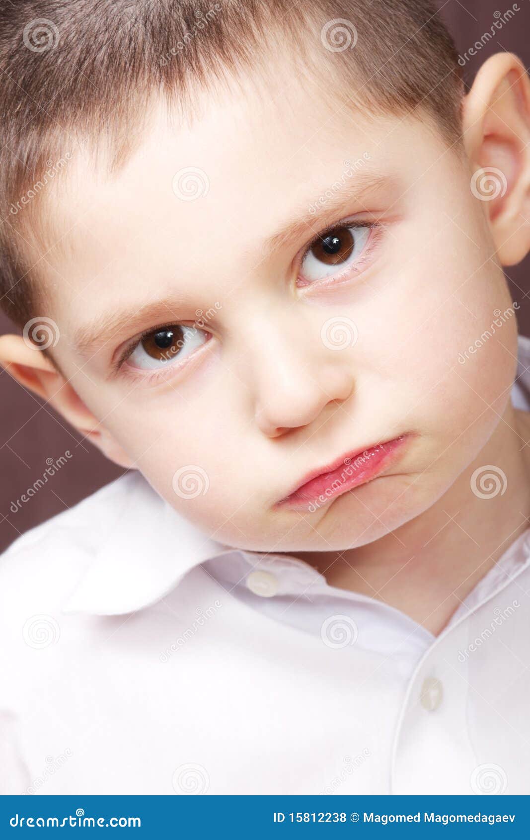 Kid in white shirt stock photo. Image of portrait, inclining - 15812238