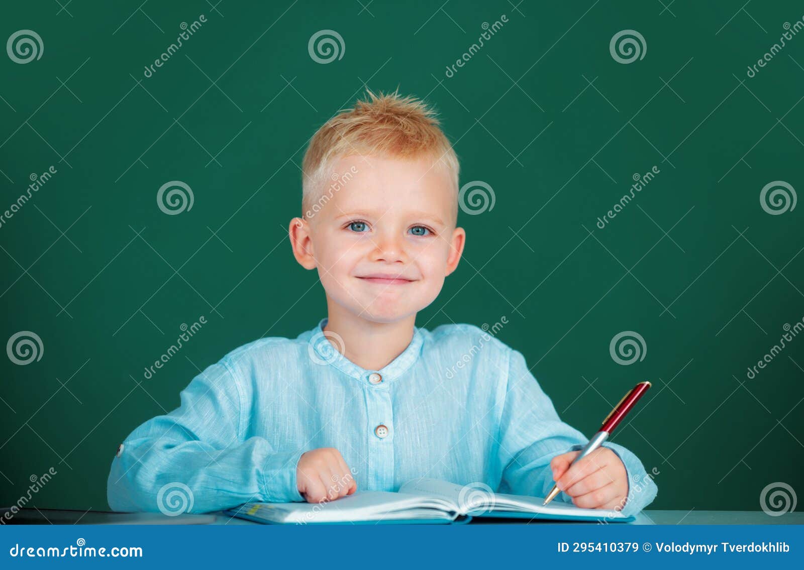 Kid Writing in Class. School Child Student Learning in Class, Study ...