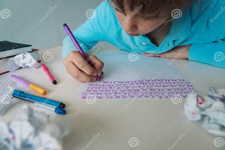 Kid Writing and Learning Numbers, Doing Math Homework Stock Photo ...