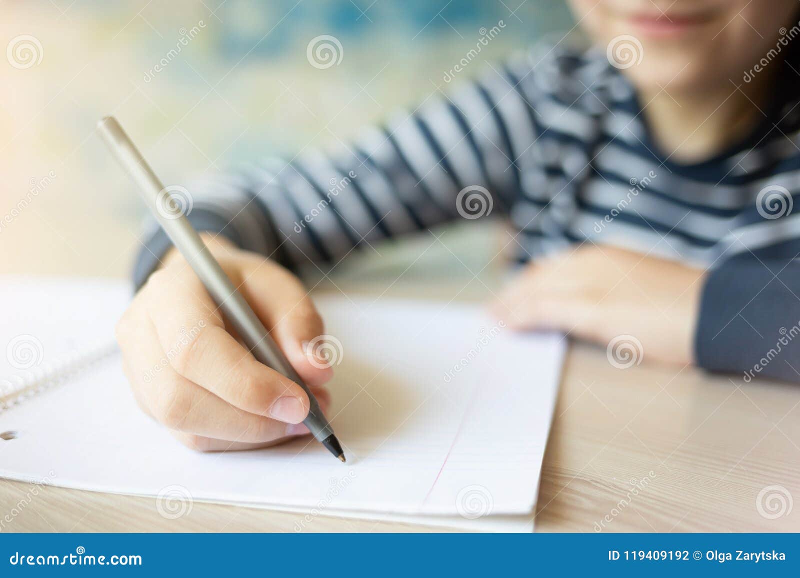 Kid writing in notebook. stock photo. Image of education - 119409192