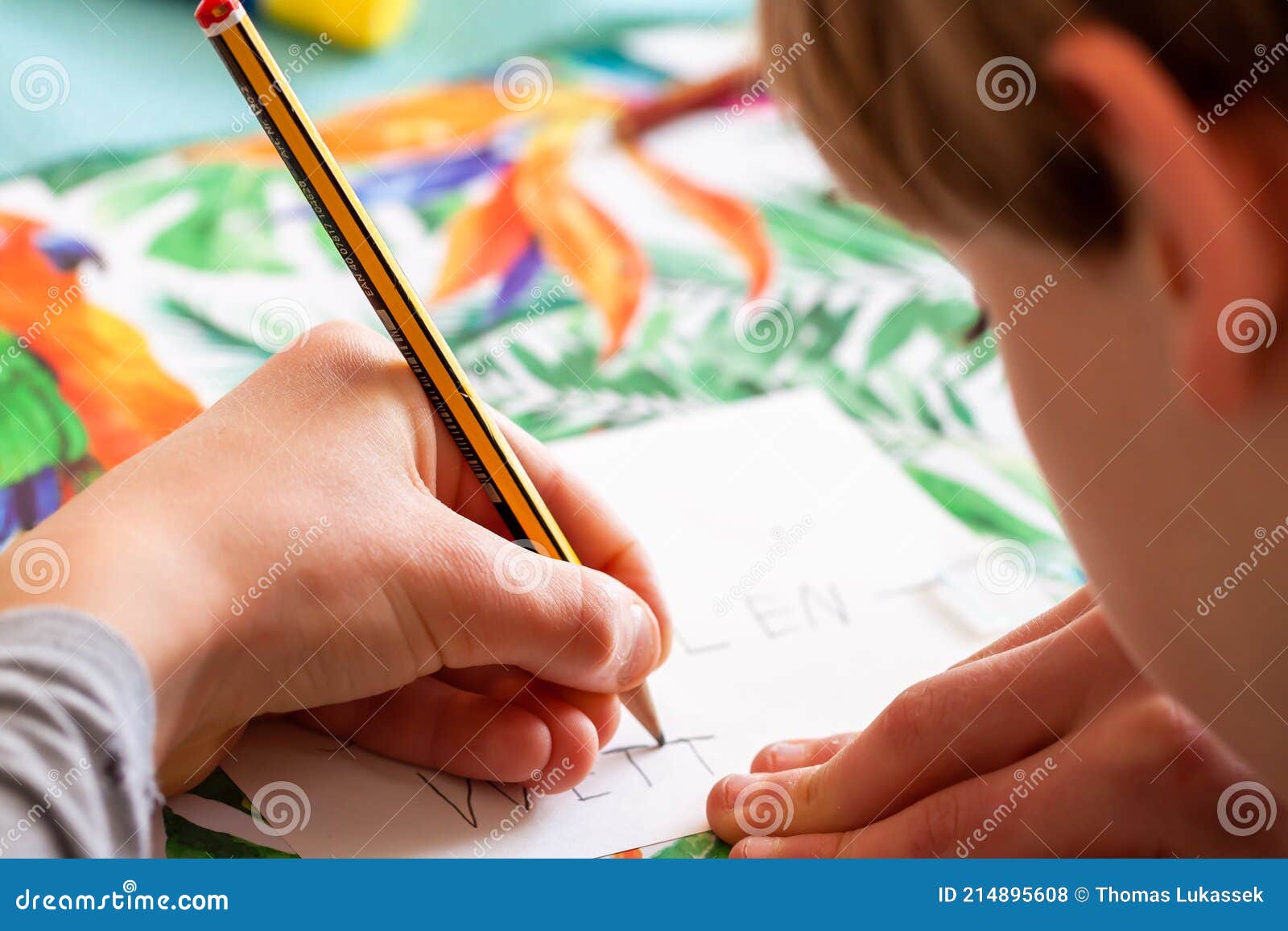 Kid Writing on Paper - Homework during the Covid 19 Pandemic Stock ...