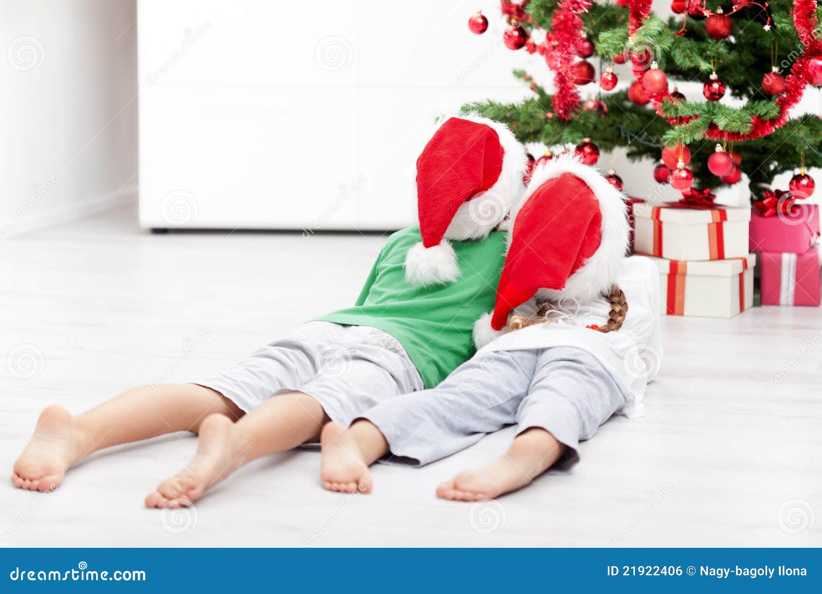 Kids Admiring the Christmas Tree Stock Photo - Image of girl, front ...