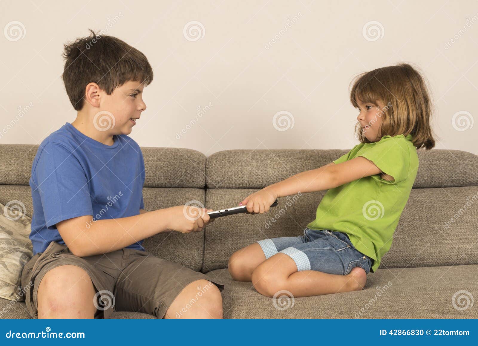 Kids Arguing for Playing with a Digital Tablet Stock Photo - Image of ...