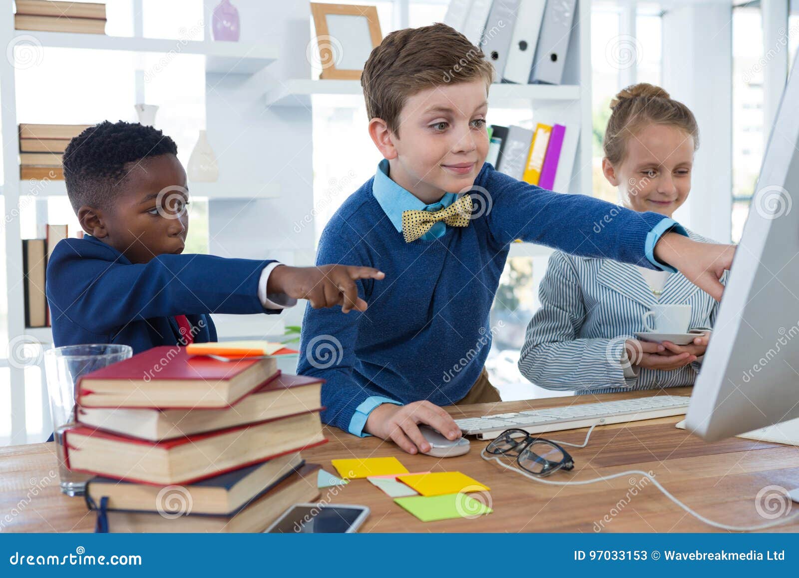 Kids As Business Executives Discussing Over Desktop Pc Stock Image ...