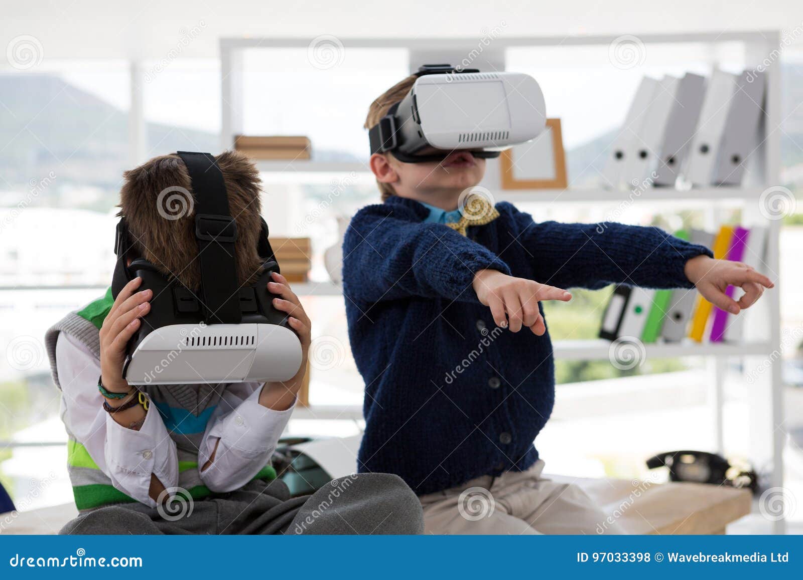 Kids As Business Executives Using Virtual Reality Headset Stock Photo ...