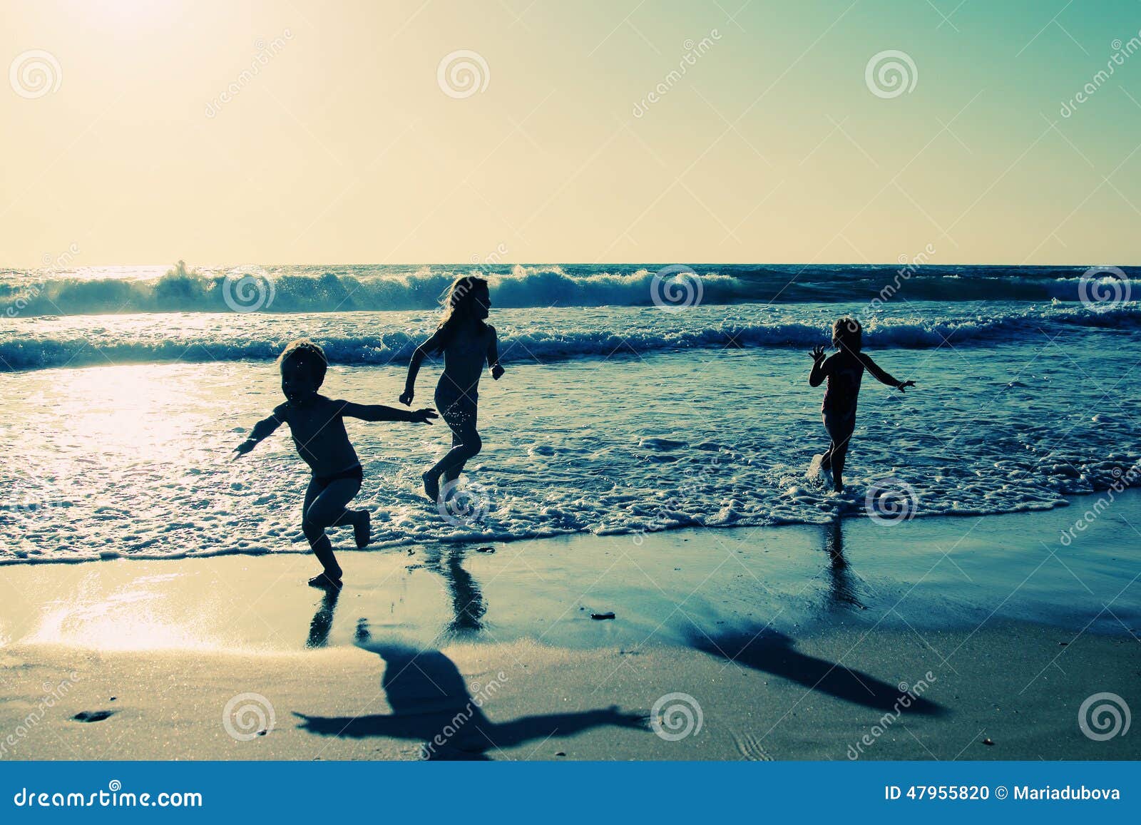 Kids on the beach stock photo. Image of outdoors, child - 47955820