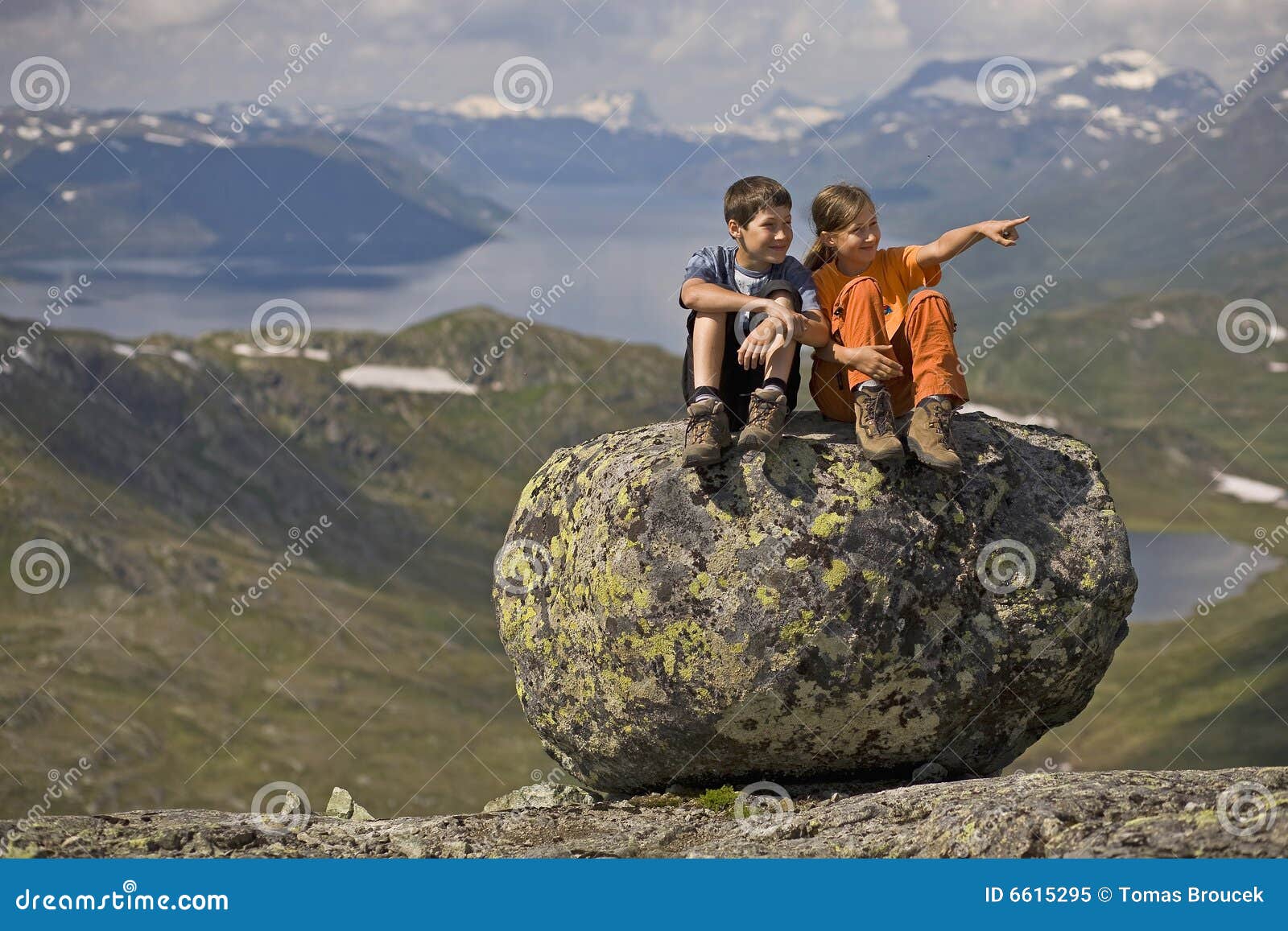 Kids on a big stone stock image. Image of orange, enjoying - 6615295