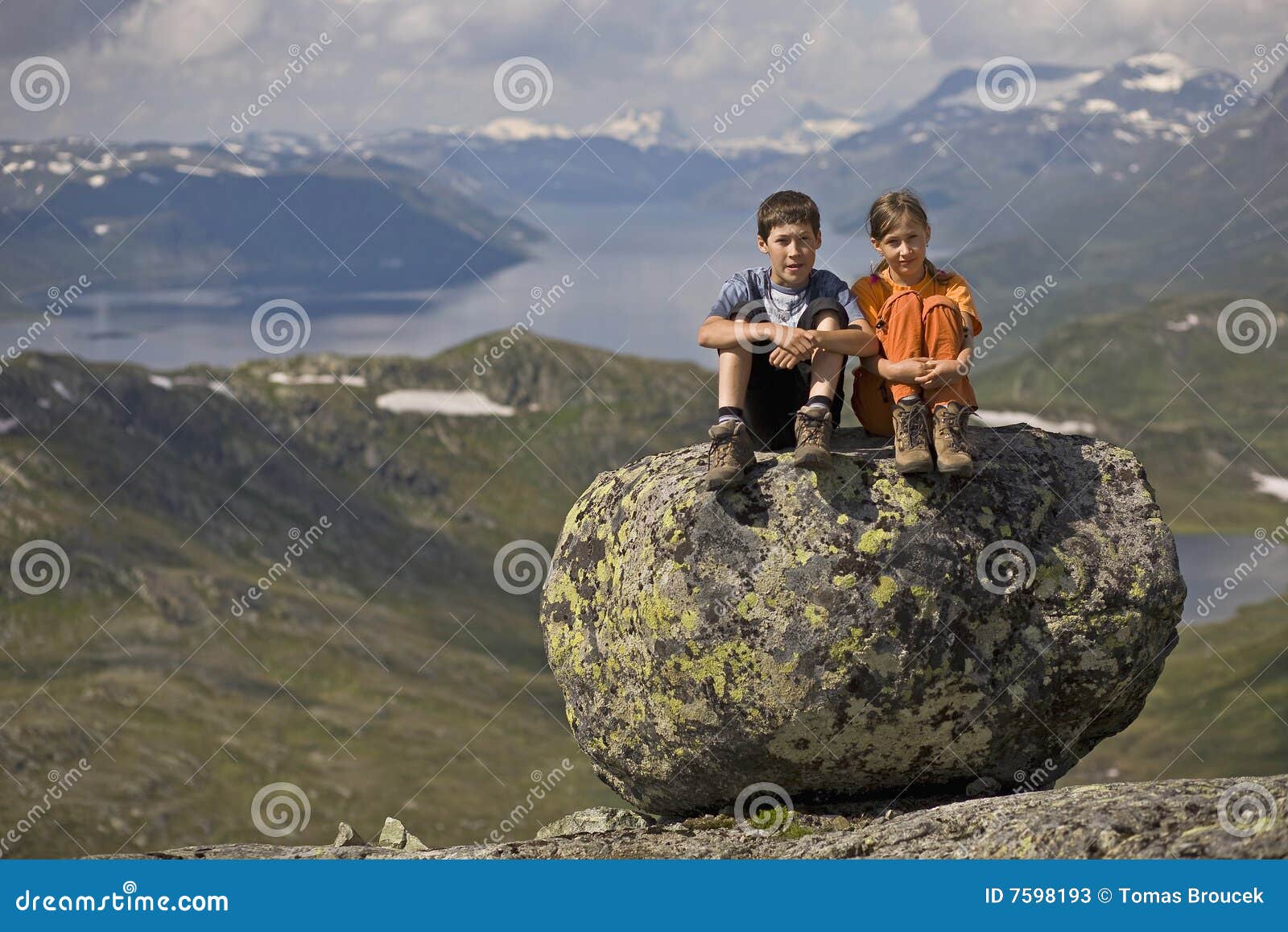 Kids on Big Stone in Mountains Stock Image - Image of beautiful ...
