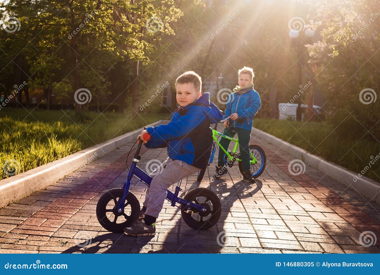 Kids on Bikes in the Spring Stock Image - Image of childhood, cycle ...
