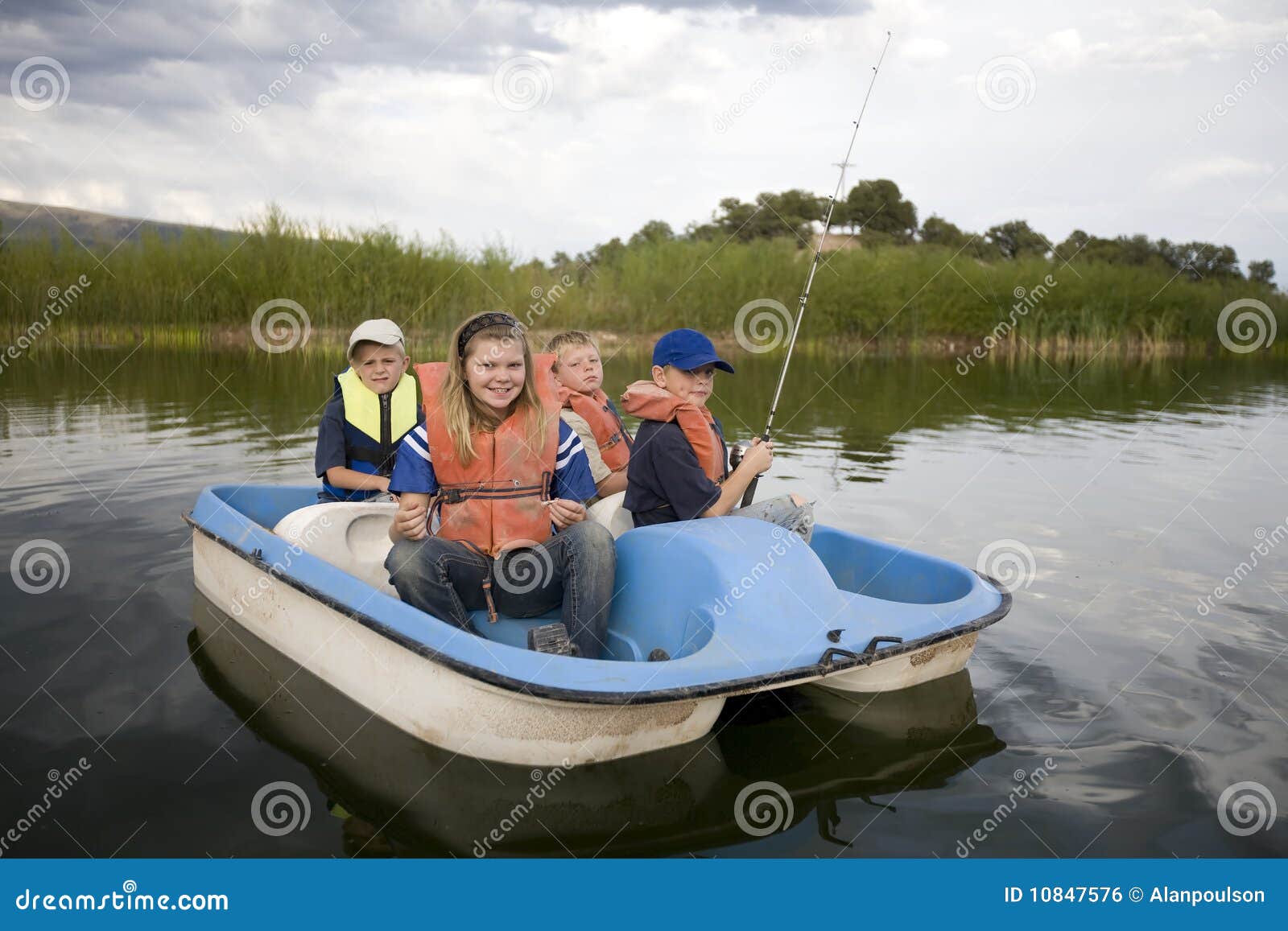 Kids in boat stock photo. Image of paddle, boat, girl - 10847576