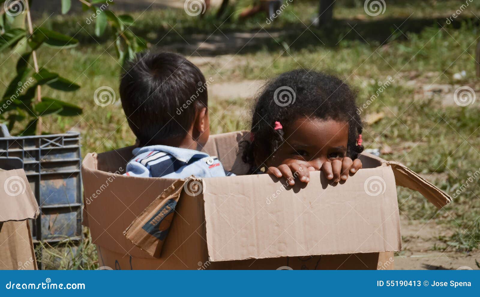 Kids in a box editorial stock photo. Image of playing - 55190413