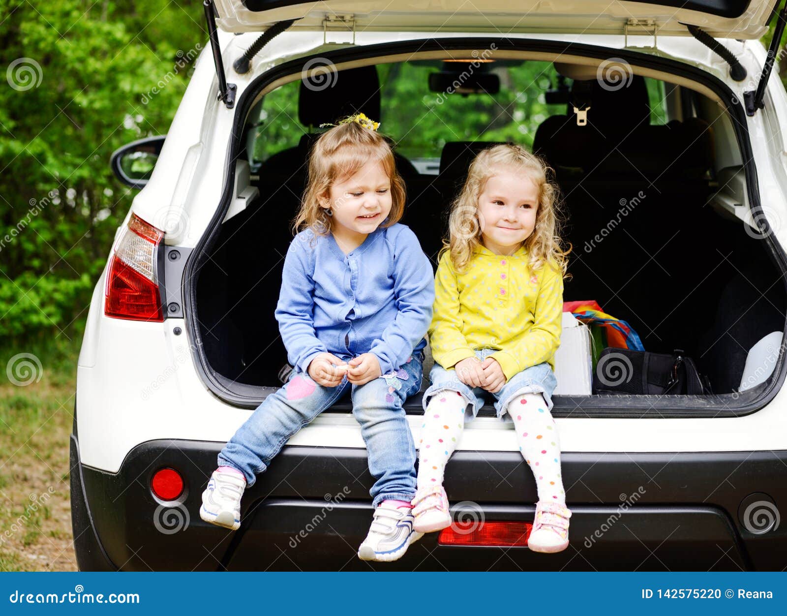 Kids in the car stock photo. Image of laughing, ride - 142575220