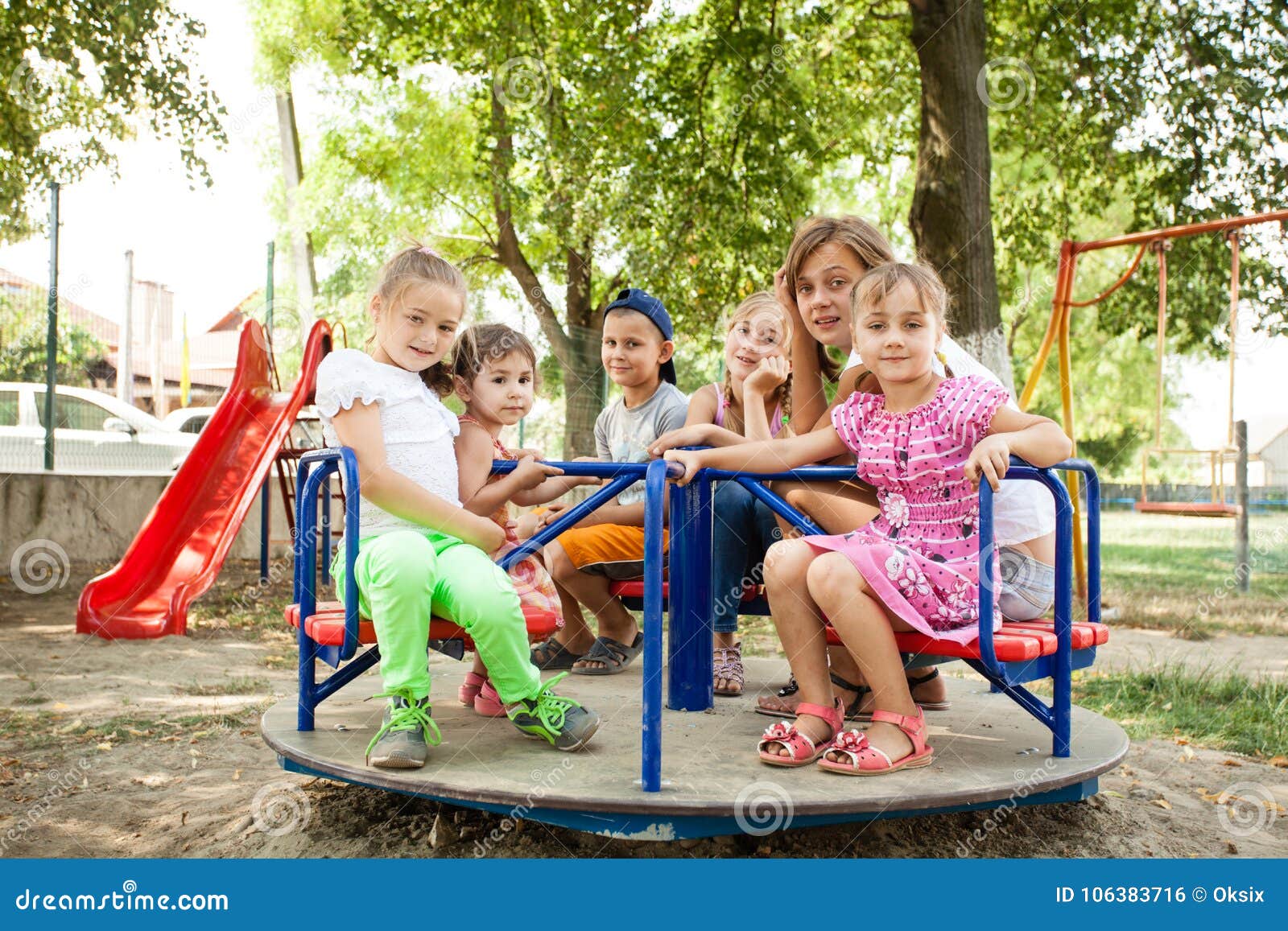 Kids on the carousel stock photo. Image of positive - 106383716